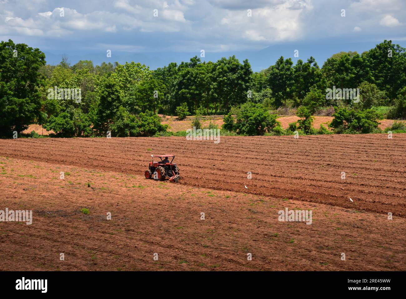 Tractors working in the field hi-res stock photography and images - Alamy