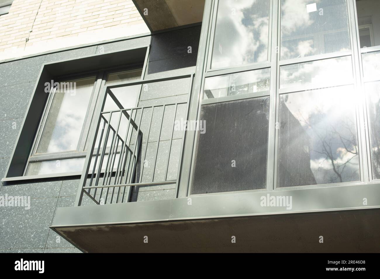 Balcony in new building. Modern residential building in detail ...