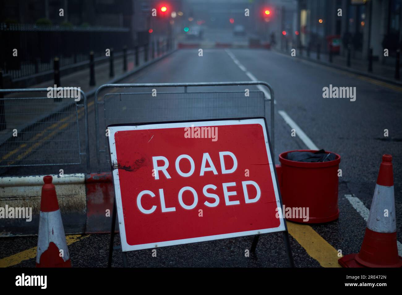 Road closed sign in empty city in the evening on Main Street Stock ...