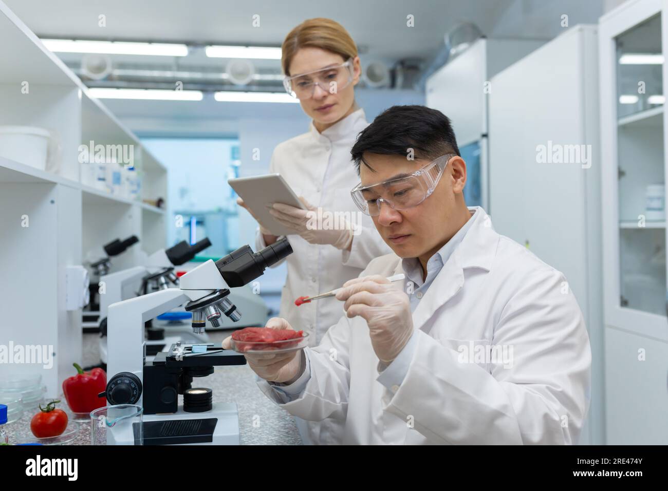 Laboratory glassware microscope in experiments hi-res stock photography ...