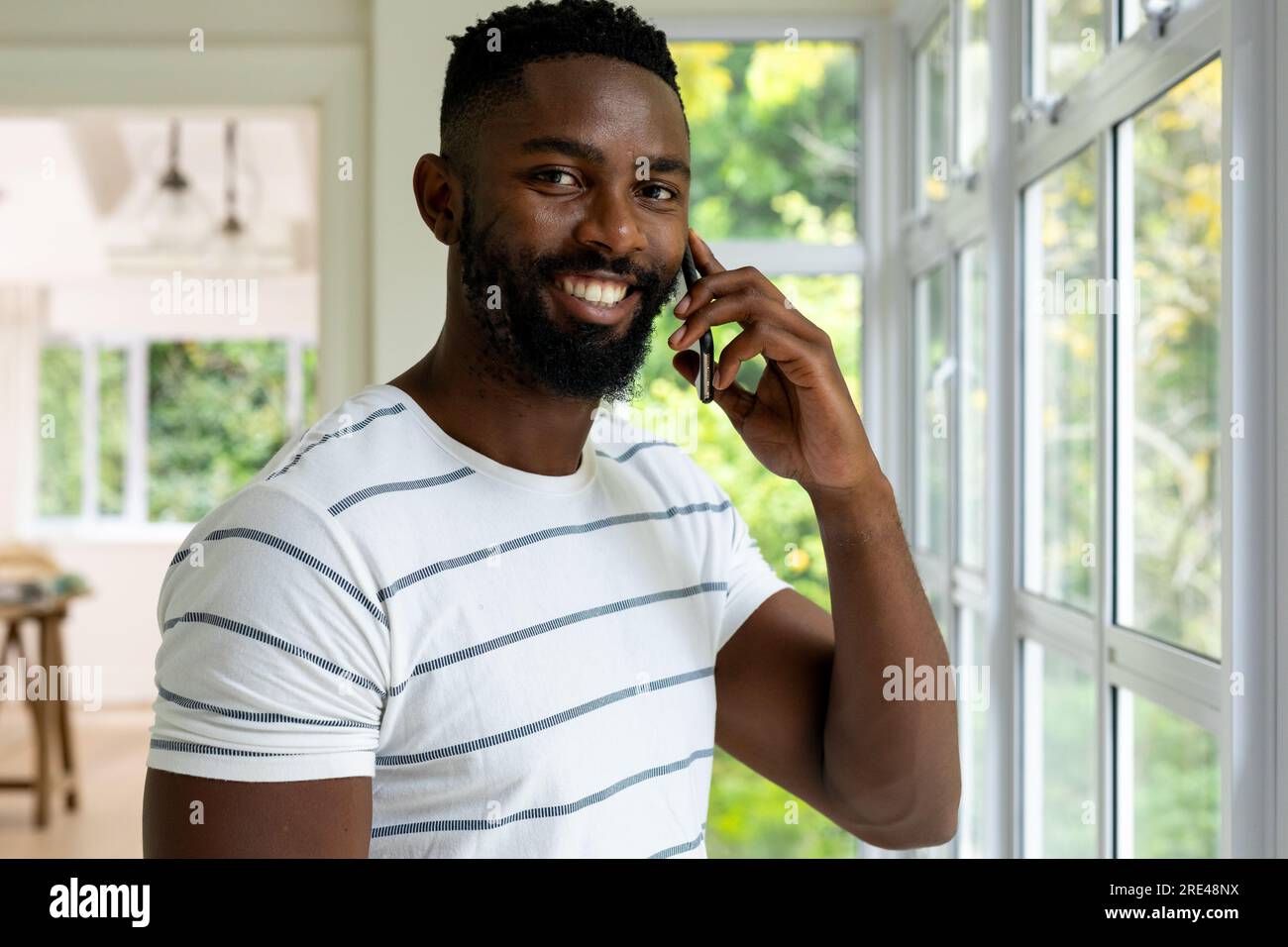 Portrait happy african man talking hi-res stock photography and images ...