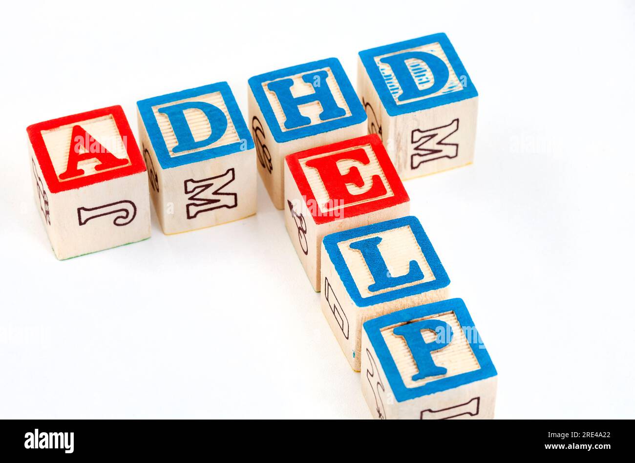 ADHD and Help in kids letter blocks on white Stock Photo - Alamy