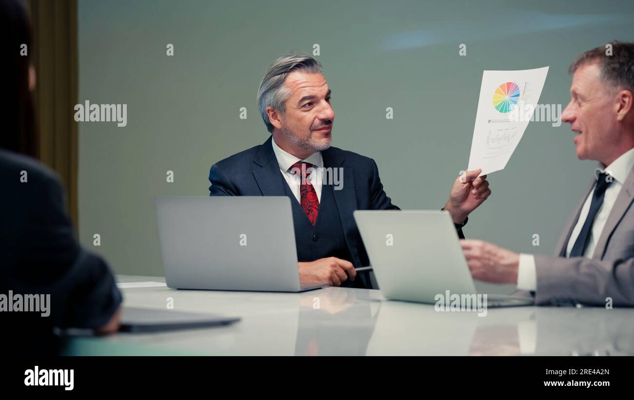 Professional businessman leader meeting with co-worker team in meeting ...