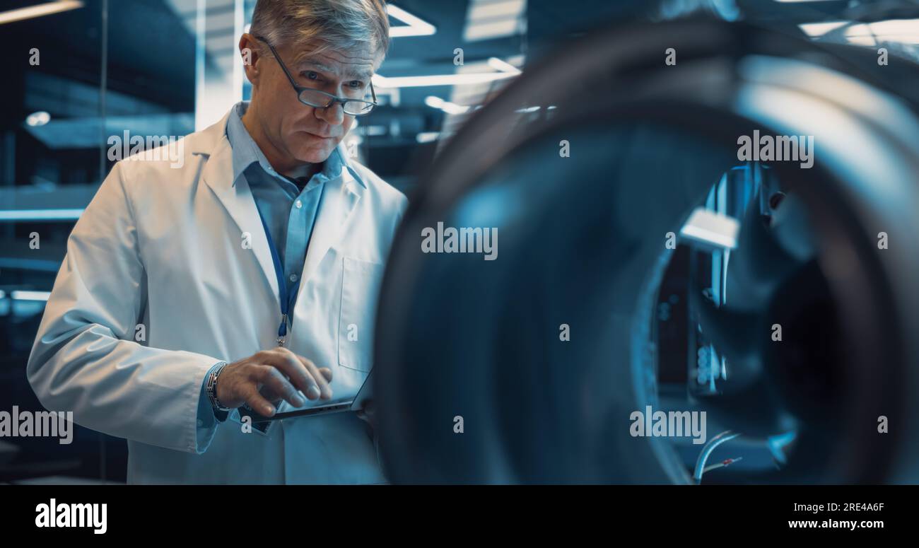 Middle Aged Industrial Turbine Specialist Working on an Innovative ...