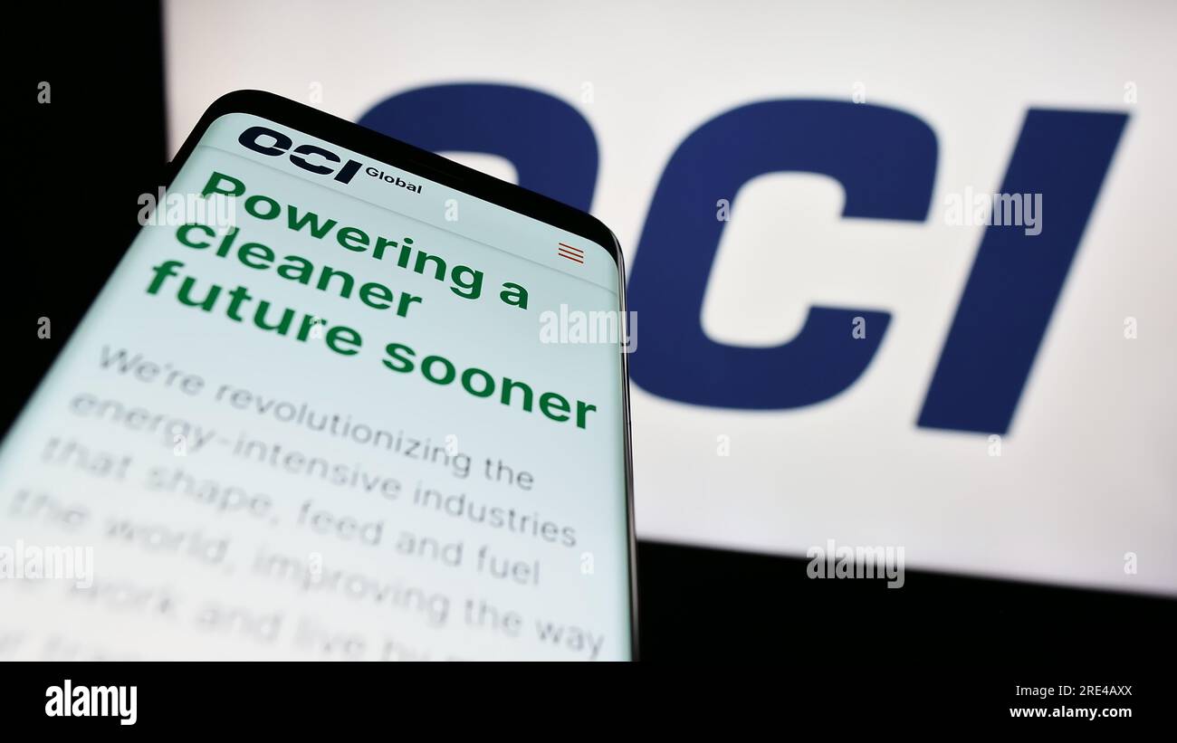 Mobile phone with webpage of Dutch chemical company OCI N.V. on screen ...