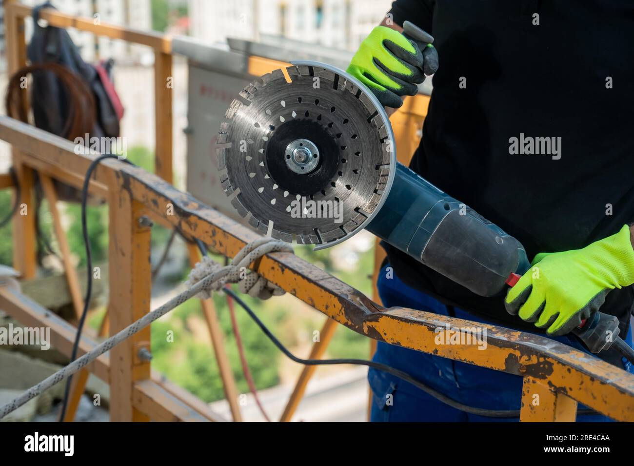 The master uses a diamond blade at a construction site Stock Photo - Alamy