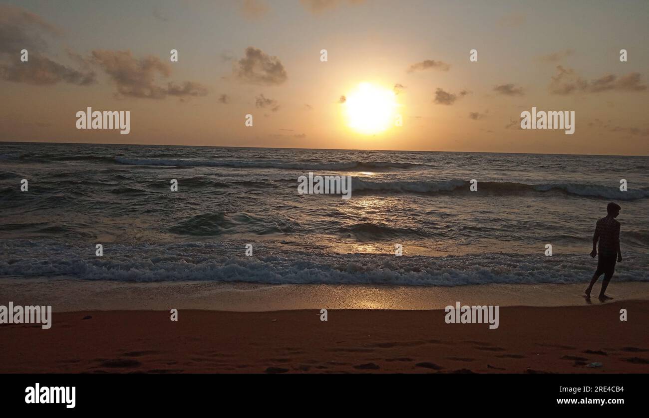 Capturing a perfect sunset at the Mount-lavinia beach which is one of ...