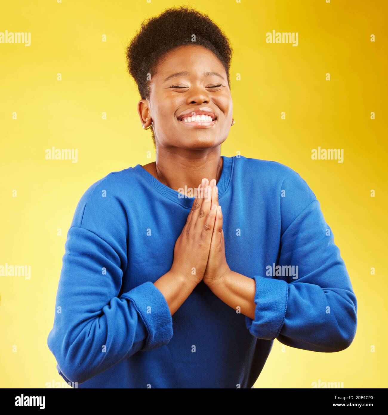Thank you, hands and black woman praying in studio happy, relief and ...