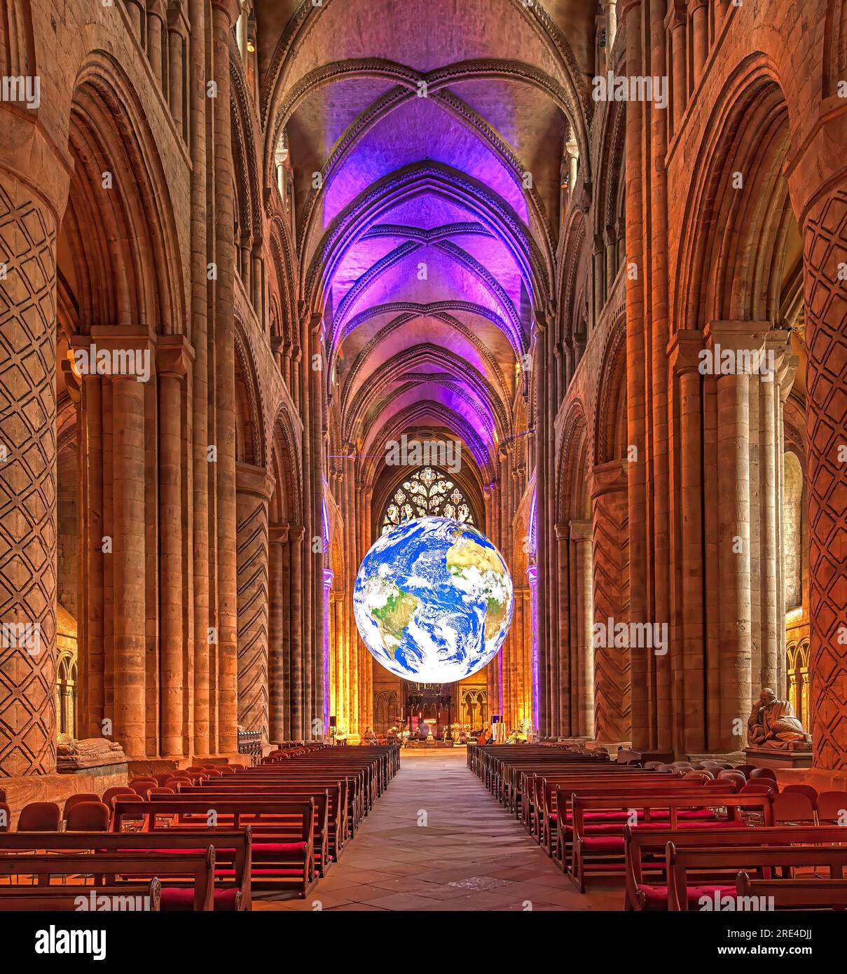 Views at night of the artwork 'Gaia' inside Durham Cathedral, Durham ...