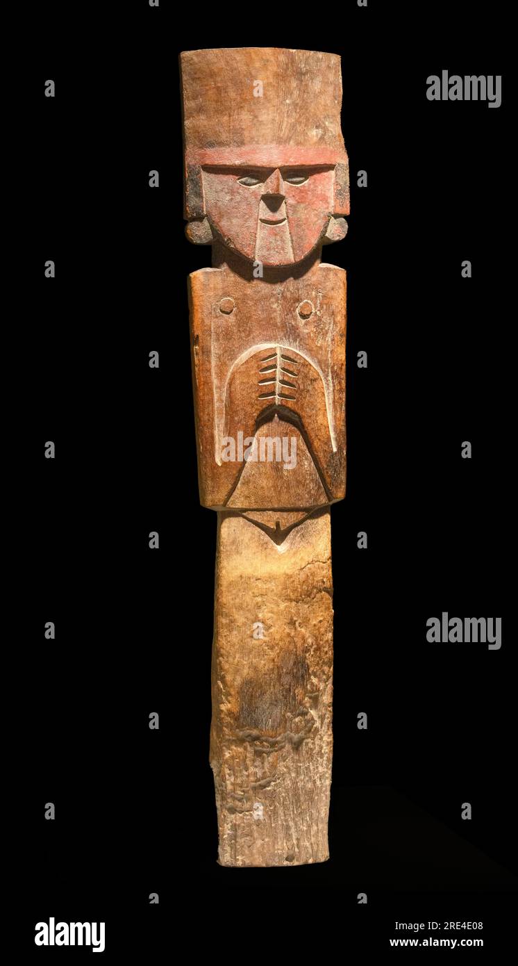 A carved wood statue of a Female figure used as a cult object in certain rituals. 1100 - 1400 AD ...