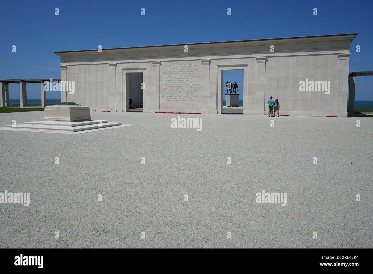 Stone Walkways at The British Normandy Memorial, with blus skies above ...
