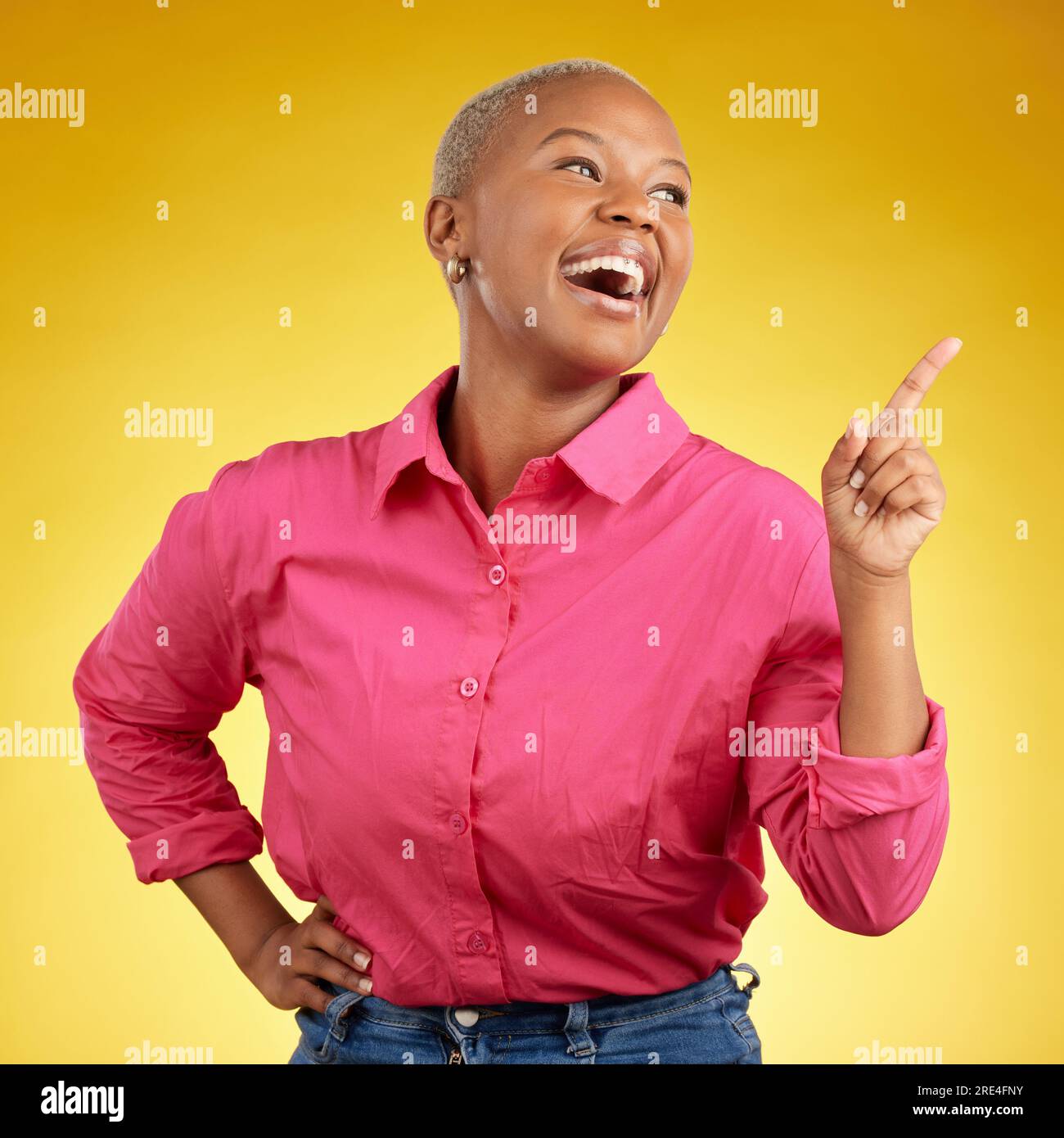 Happy, black woman and hand pointing in studio for news, deal or coming ...