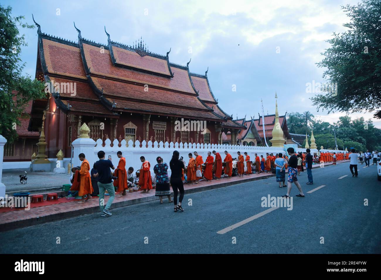 luang prabang laos - july22,2023 : villager and tourist offering sticky ...