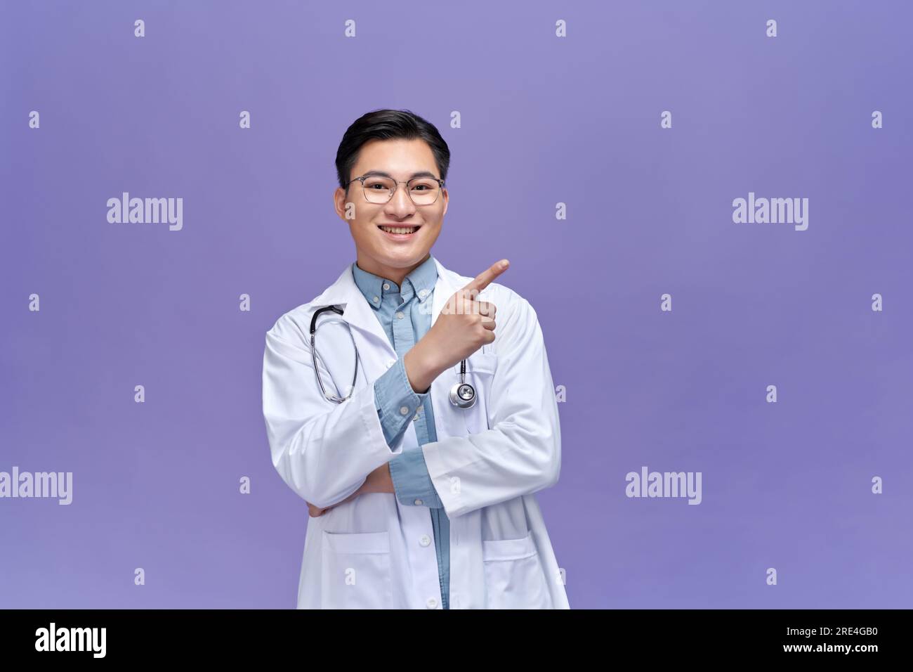Successful doctor pointing hi-res stock photography and images - Alamy