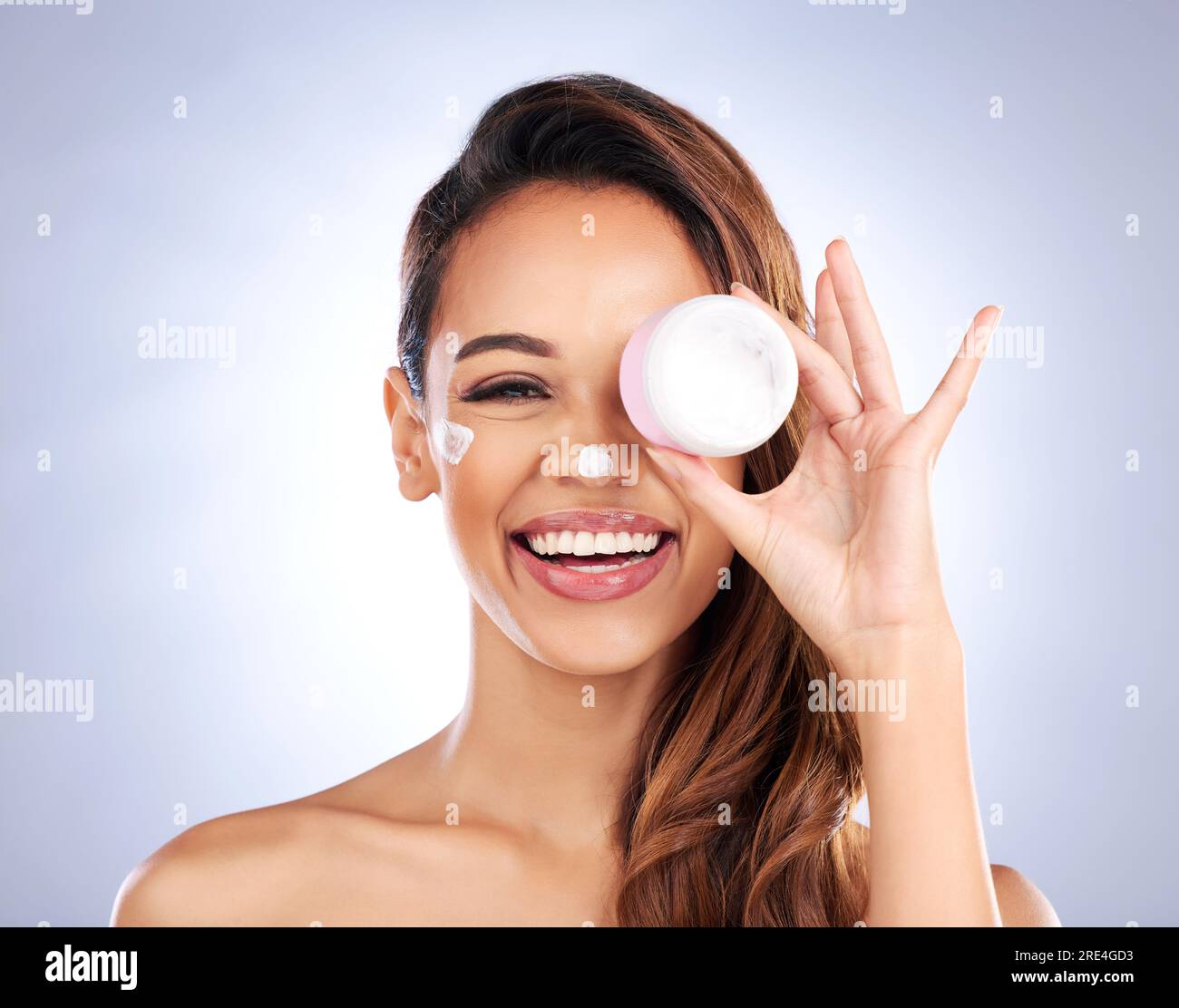 Portrait, cream jar and beauty of woman in studio with cosmetics ...