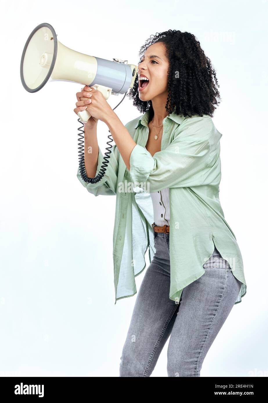 Woman, megaphone and angry protest in studio with shouting, noise and ...