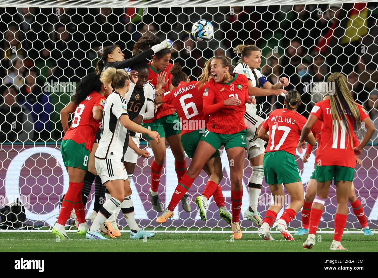 Morocco's goalkeeper Khadija Er-Rmichi tries to punch the ball away as ...