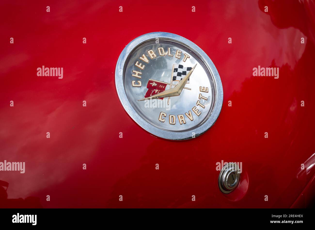 The distinctive circular name badge with its crossed flags fixed to the ...