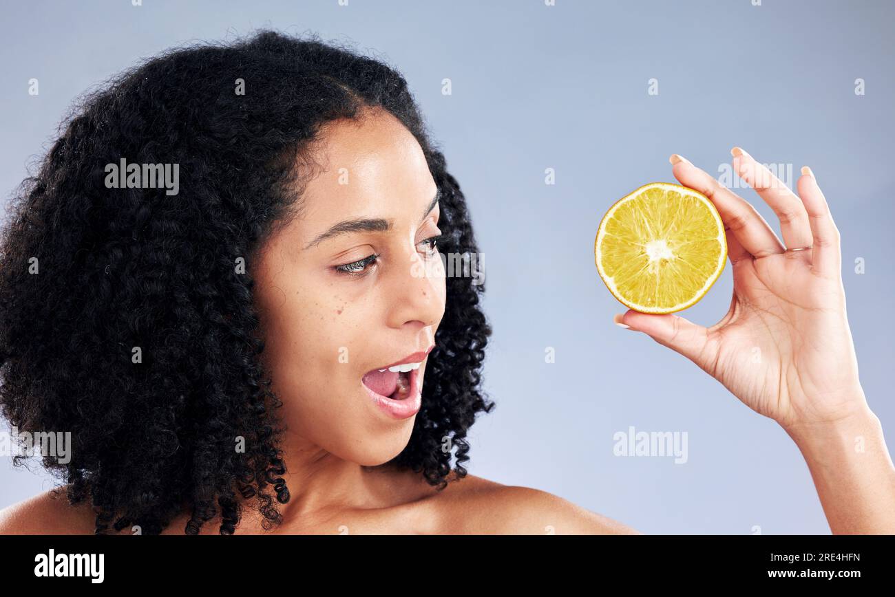 Woman, lemon and thinking for skincare, studio and wow for natural ...