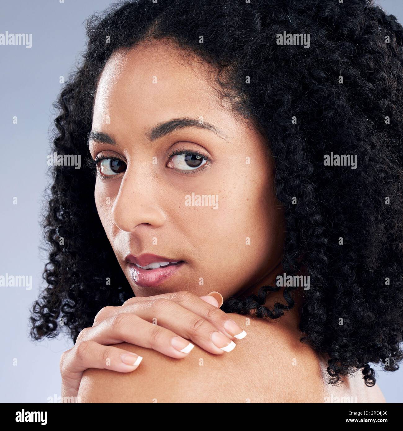 Beauty, skincare and touch with portrait of woman in studio for ...