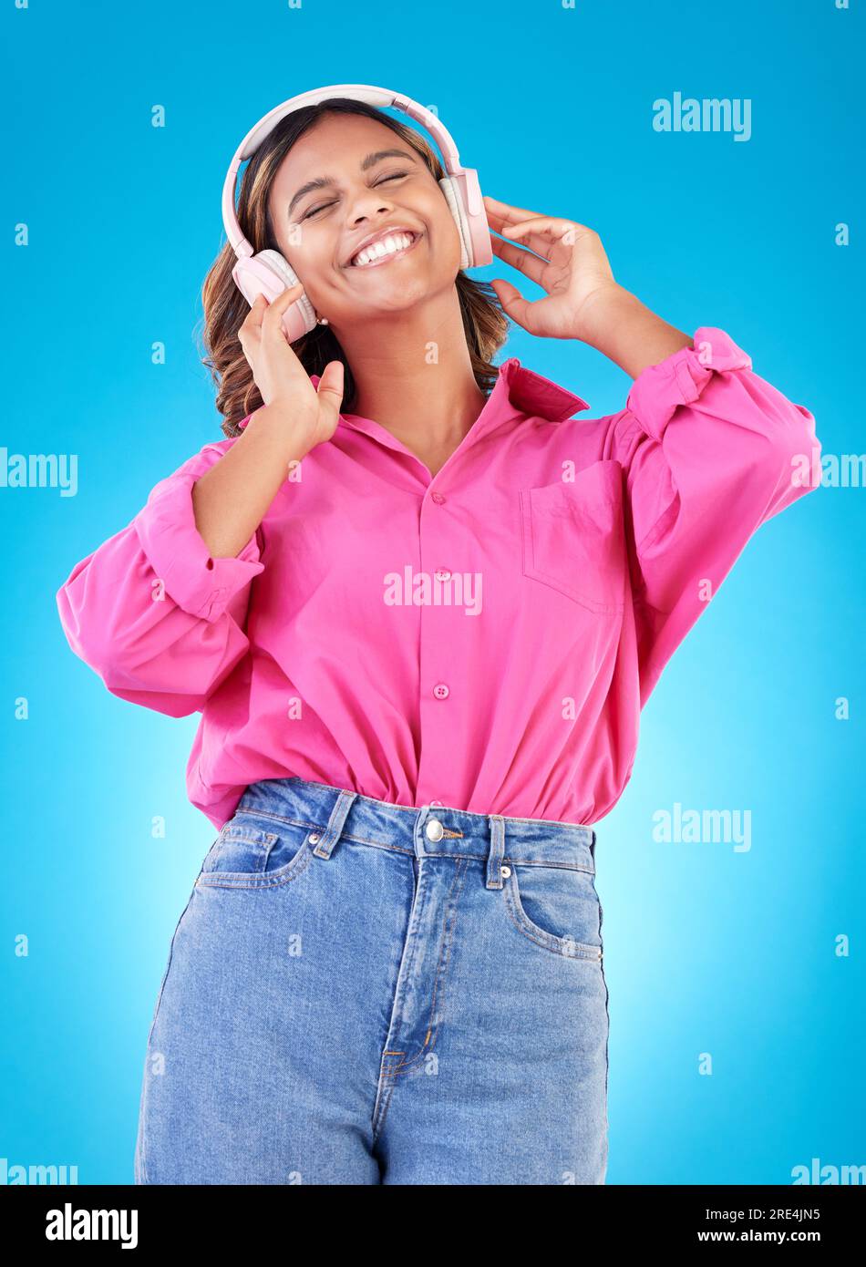 Young woman, headphones and music, audio streaming service and techno ...