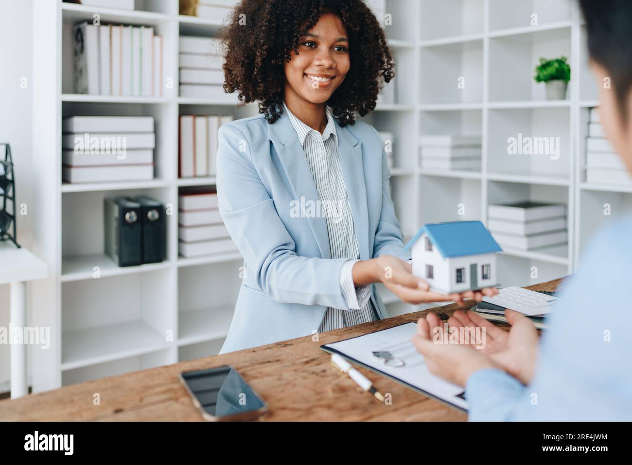Female African american Real estate company to buy houses and land are ...