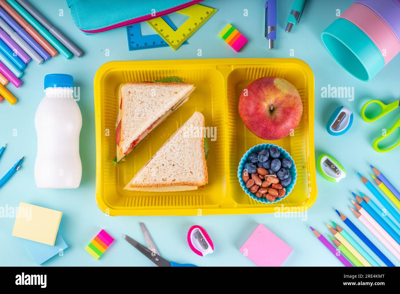 Healthy school meal, children packed lunch box with fruit, berry, nuts ...