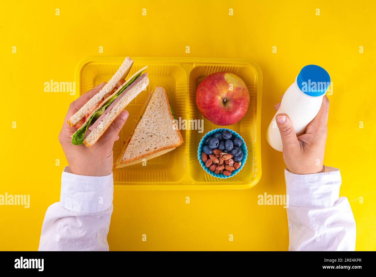 Healthy school meal, children packed lunch box with fruit, berry, nuts ...