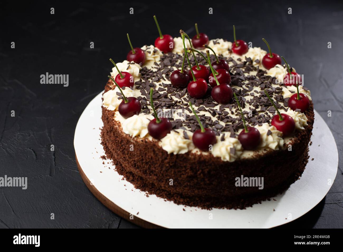 Cherry, red berry crumble in baking dish. Grey background Stock Photo ...