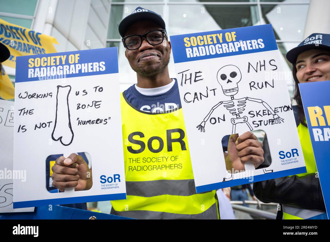 London, UK. 25 July 2023. Radiographers at a picket line outside ...