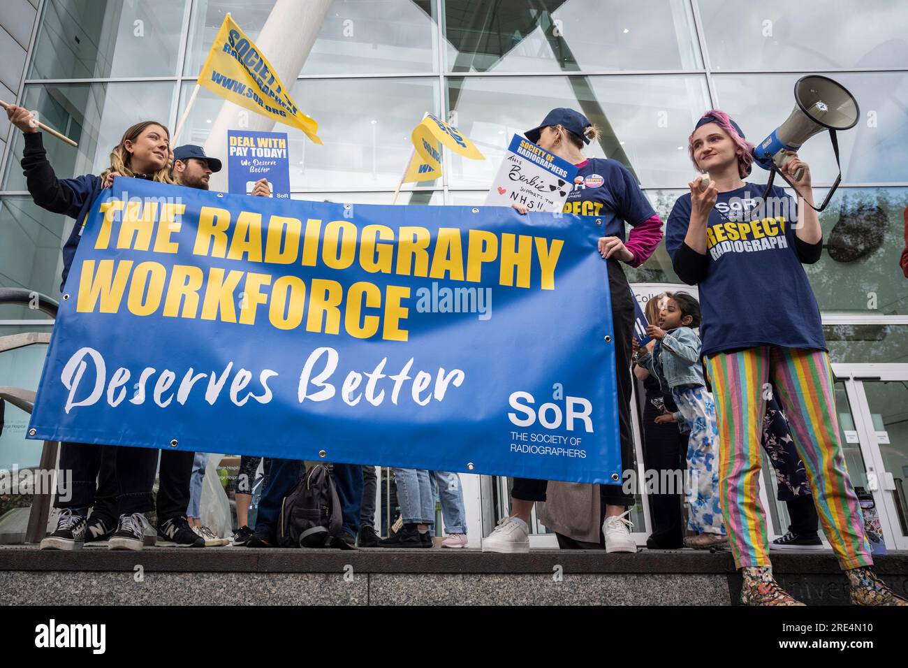 London, UK. 25 July 2023. Radiographers at a picket line outside ...