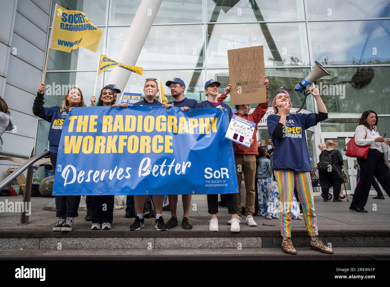 London, UK. 25 July 2023. Radiographers at a picket line outside ...