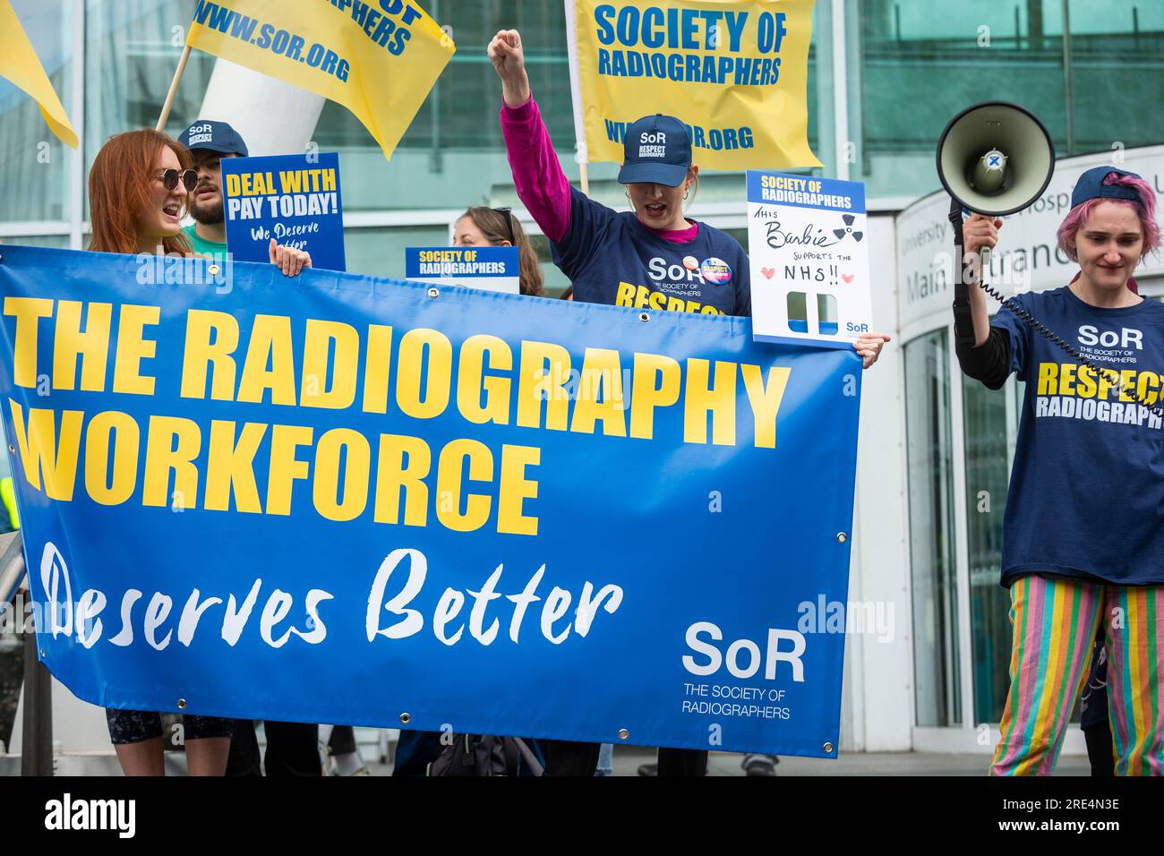 London, UK. 25 July 2023. Radiographers at a picket line outside ...
