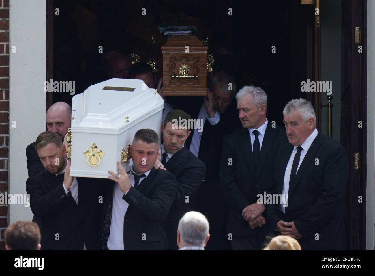 The coffins of Eoin Fitzpatrick and his son Dylan Fitzpatrick, are ...