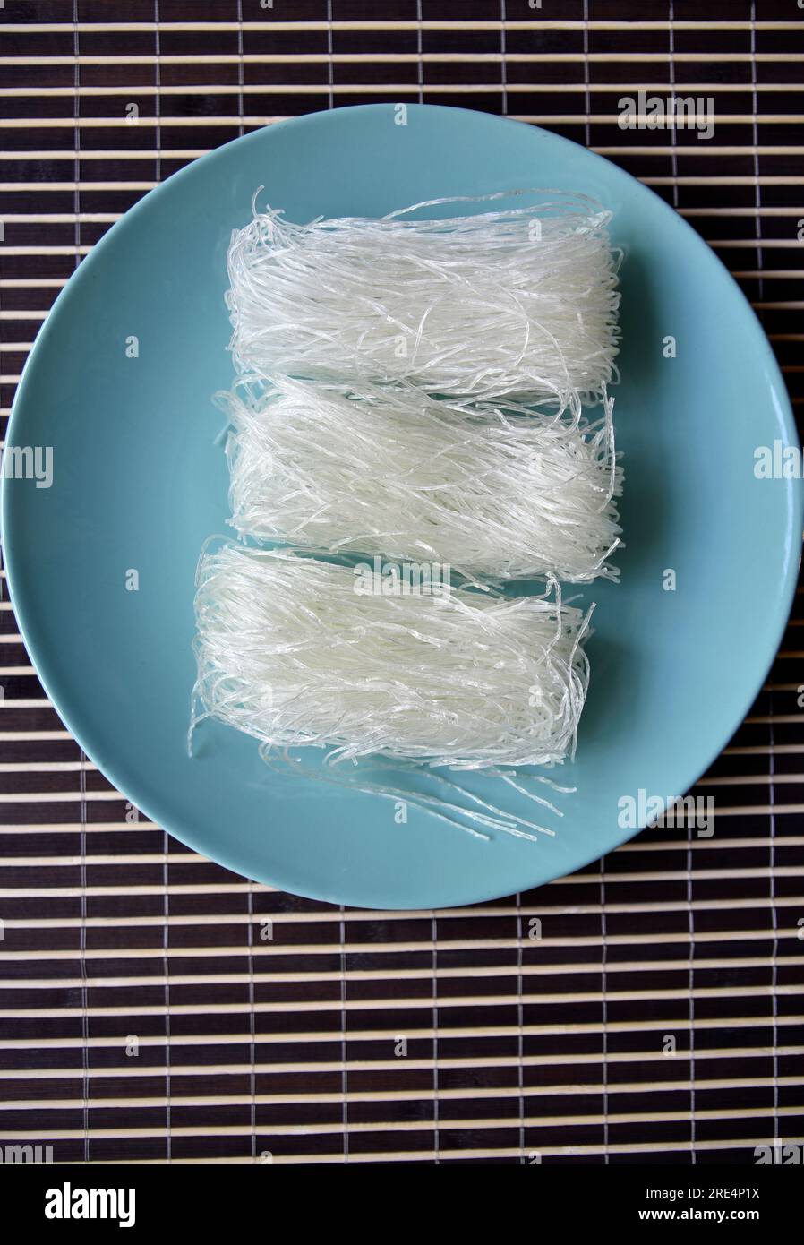 Dry rice noodles for cooking Korean dishes. Asian food. Top view ...