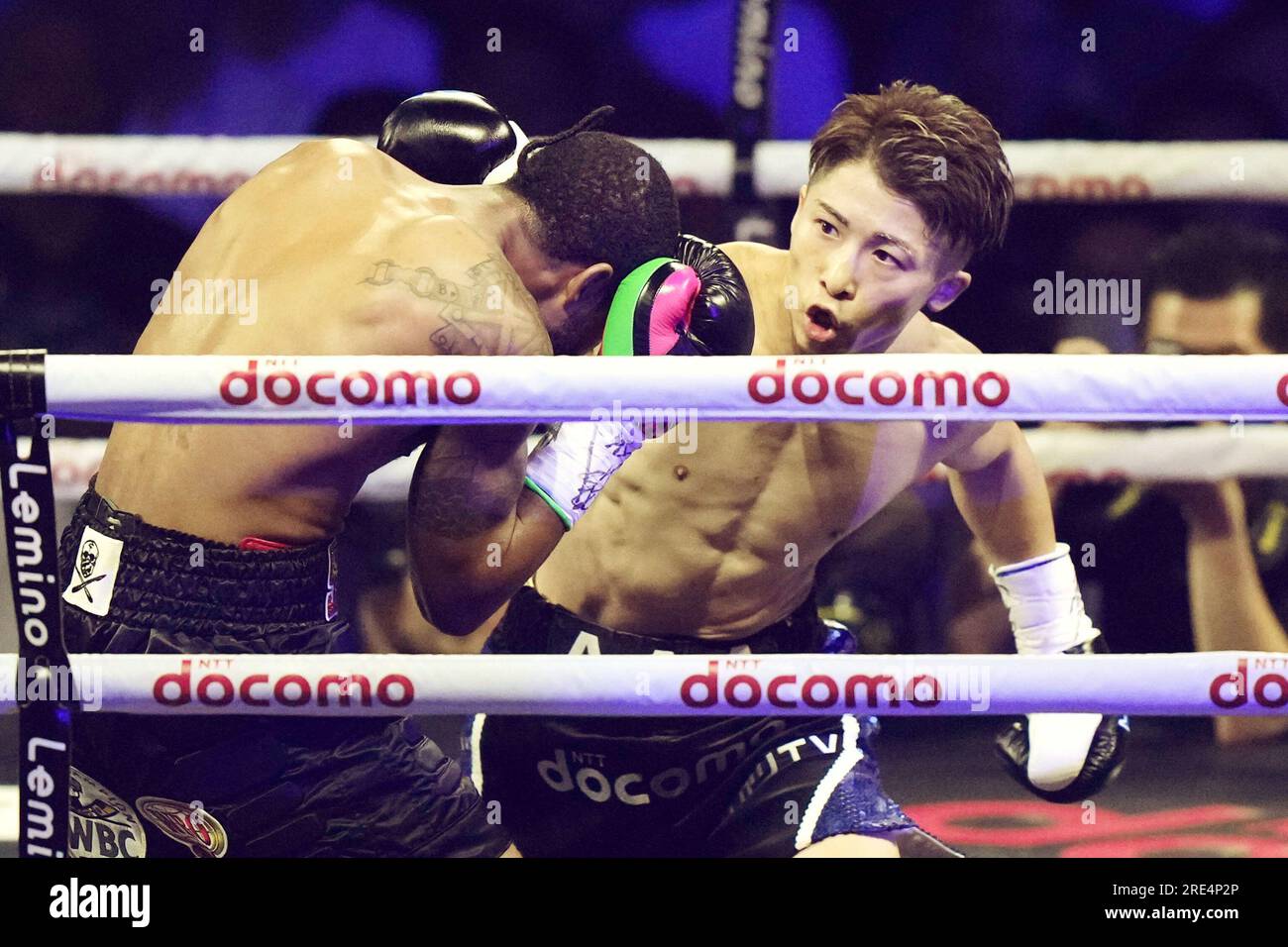 Japanese boxer Naoya Inoue (R) throws a punch at Stephen Fulton of the ...