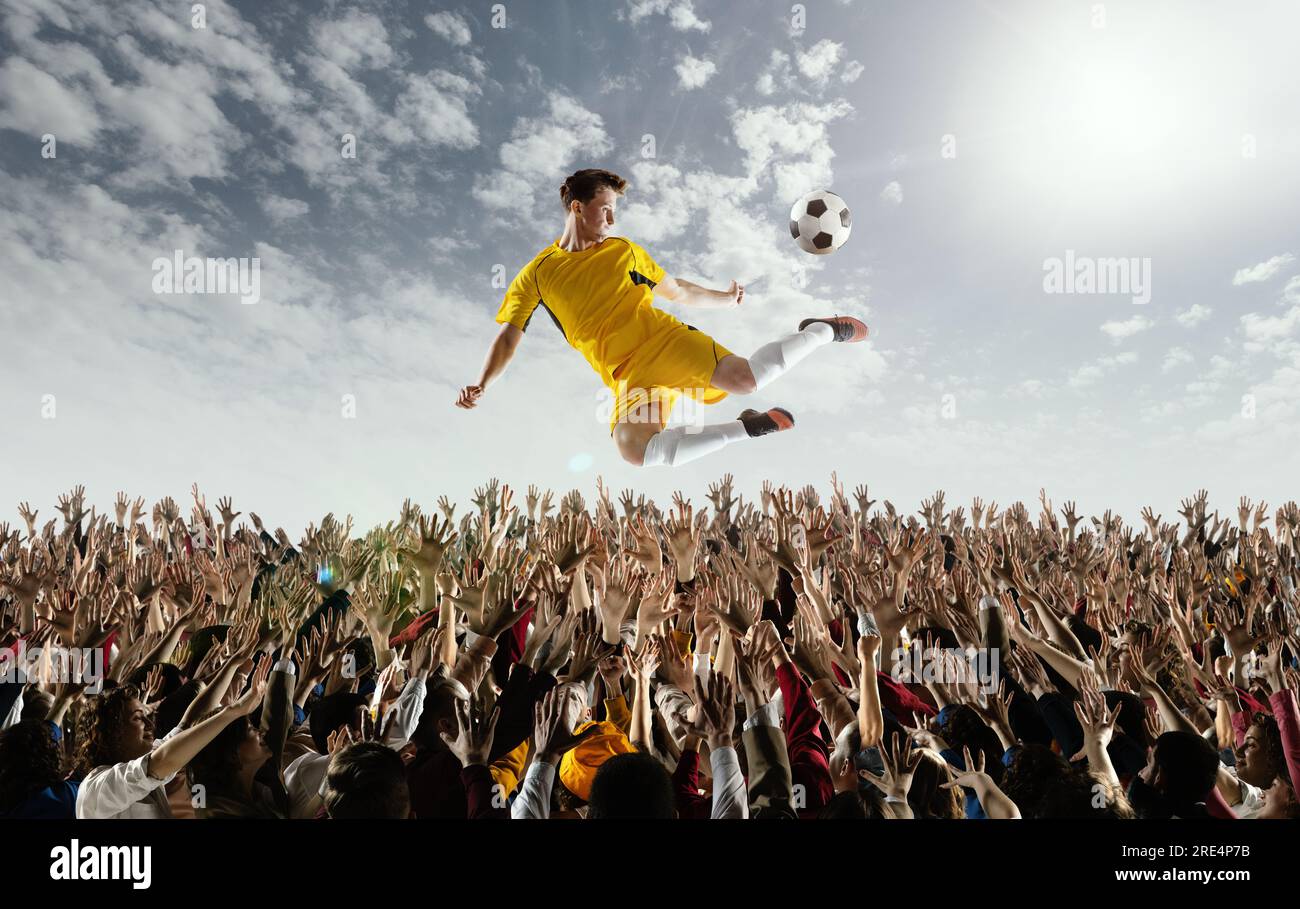 Flying over crowd people cheering hi-res stock photography and images ...