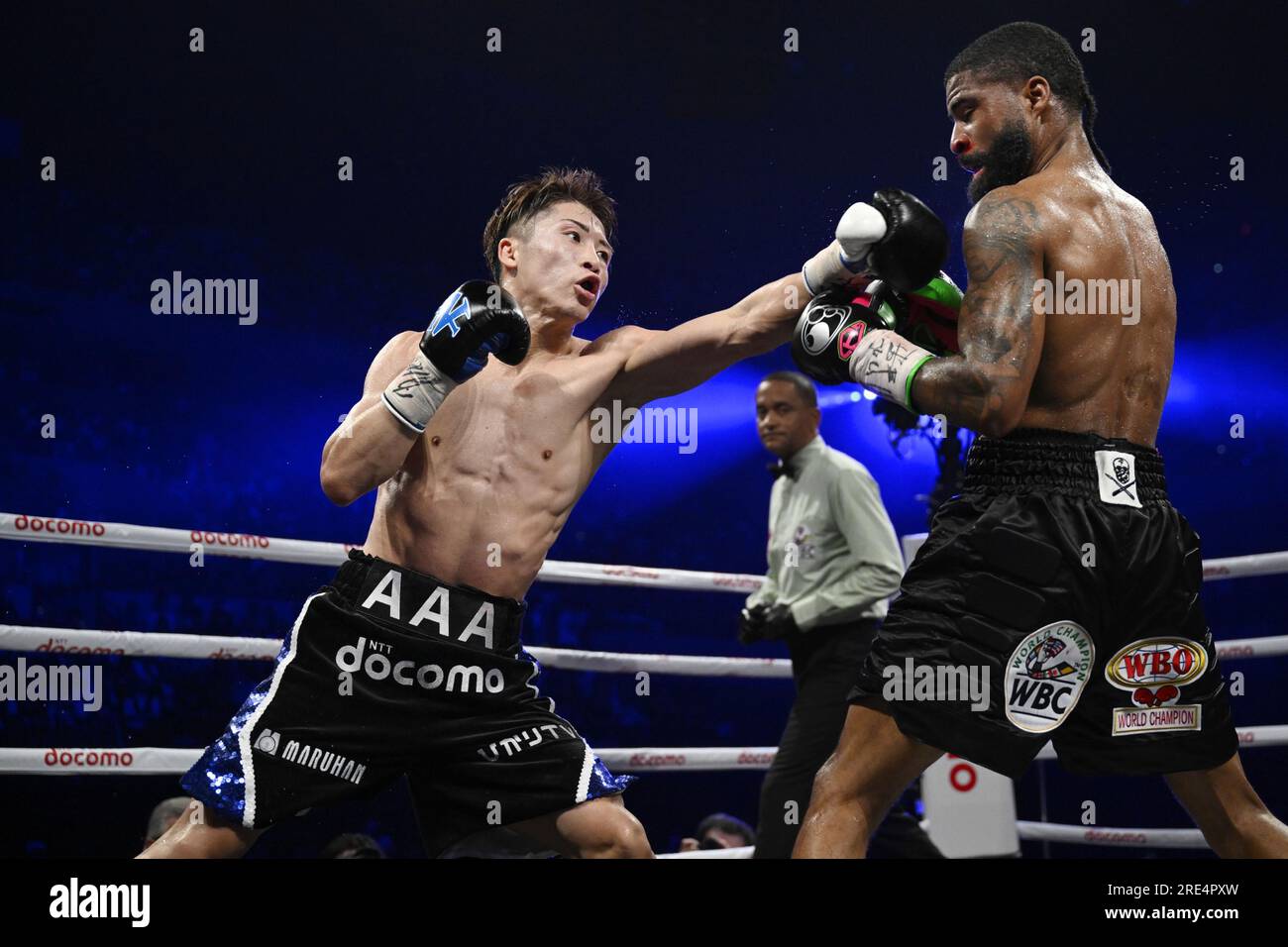 Japanese boxer Naoya Inoue (L) throws a punch at Stephen Fulton of the ...