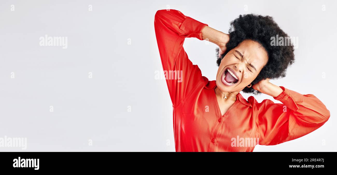 Anger, shouting and a black woman with stress on a studio background ...