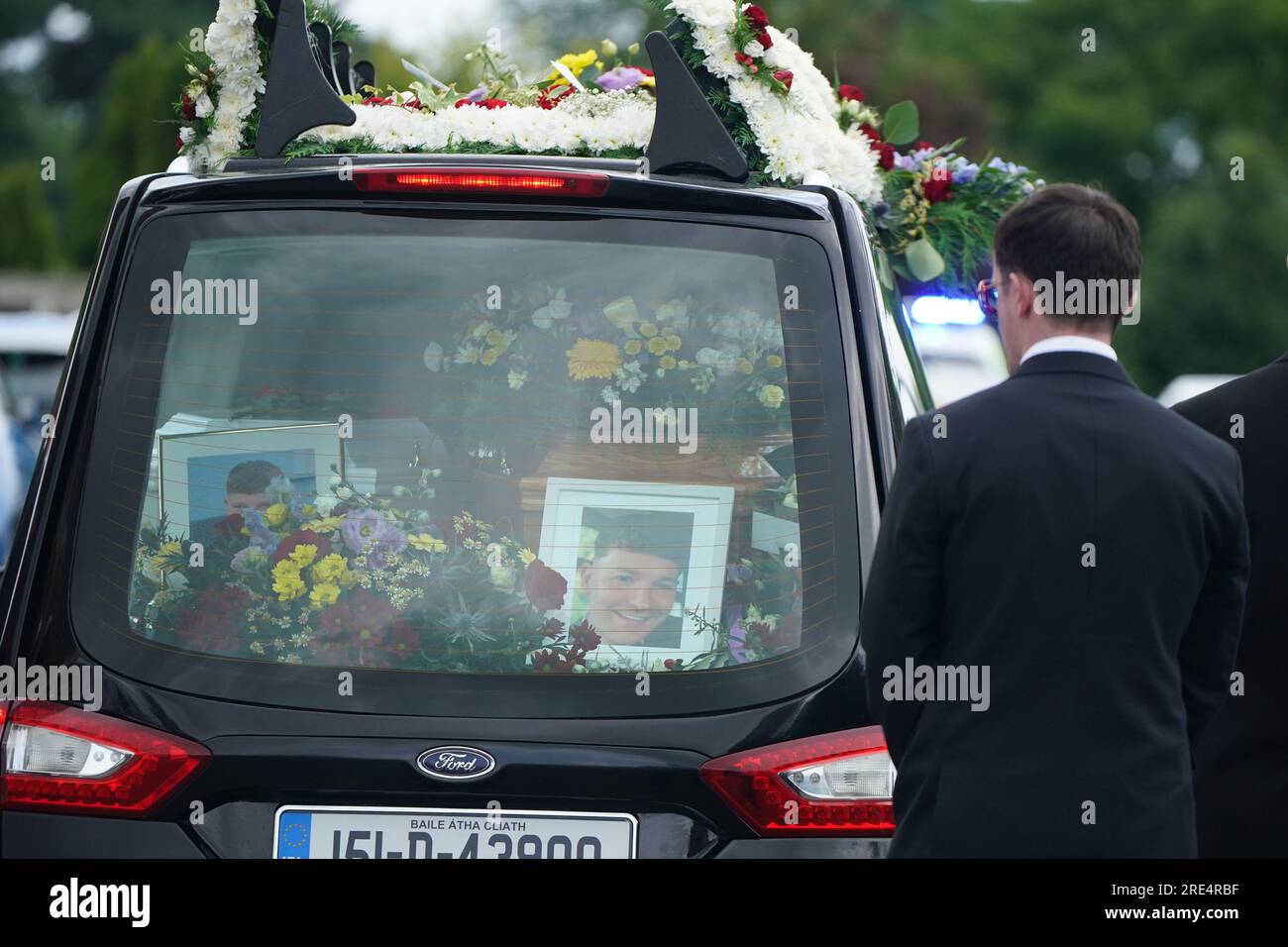 The coffins of Eoin Fitzpatrick and his son Dylan Fitzpatrick, are ...