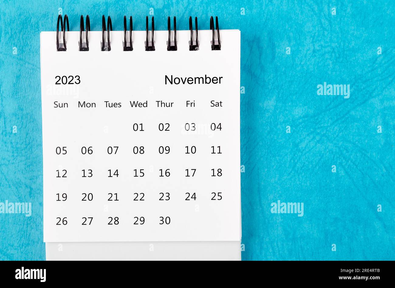 November 2023 Monthly desk calendar for 2023 year on blue background ...