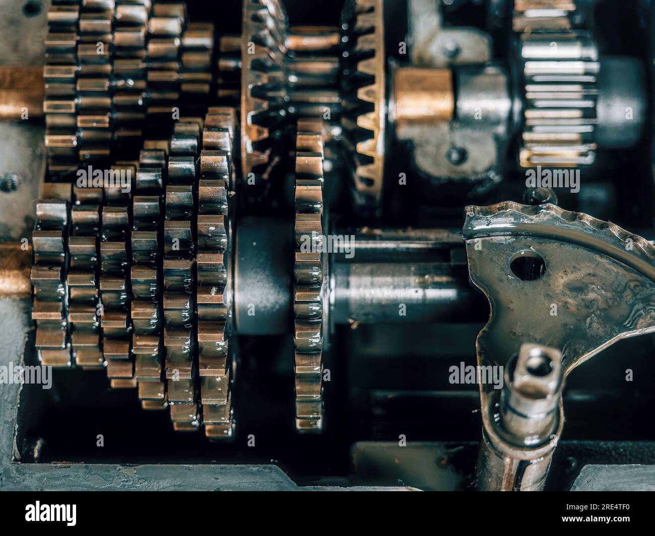 Mechanism gears in machine oil close-up. Gearbox repair. Background ...