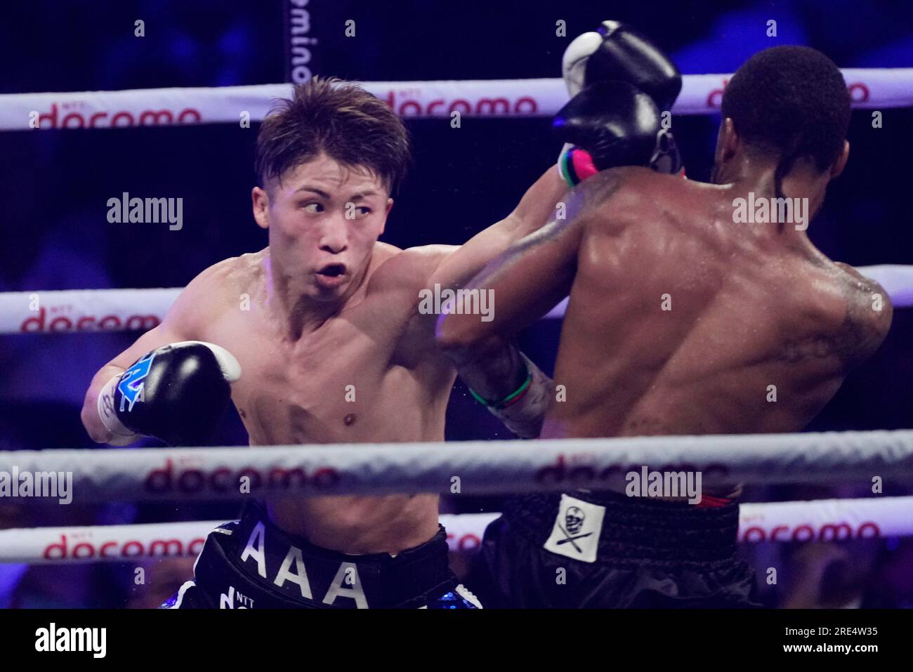 Naoya Inoue of Japan, left, throws a punch against Stephen Fulton of the U.S. during the seventh ...