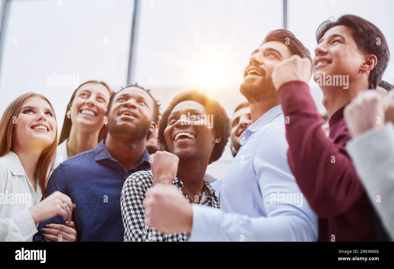 Cheering business team clenched hi-res stock photography and images - Alamy
