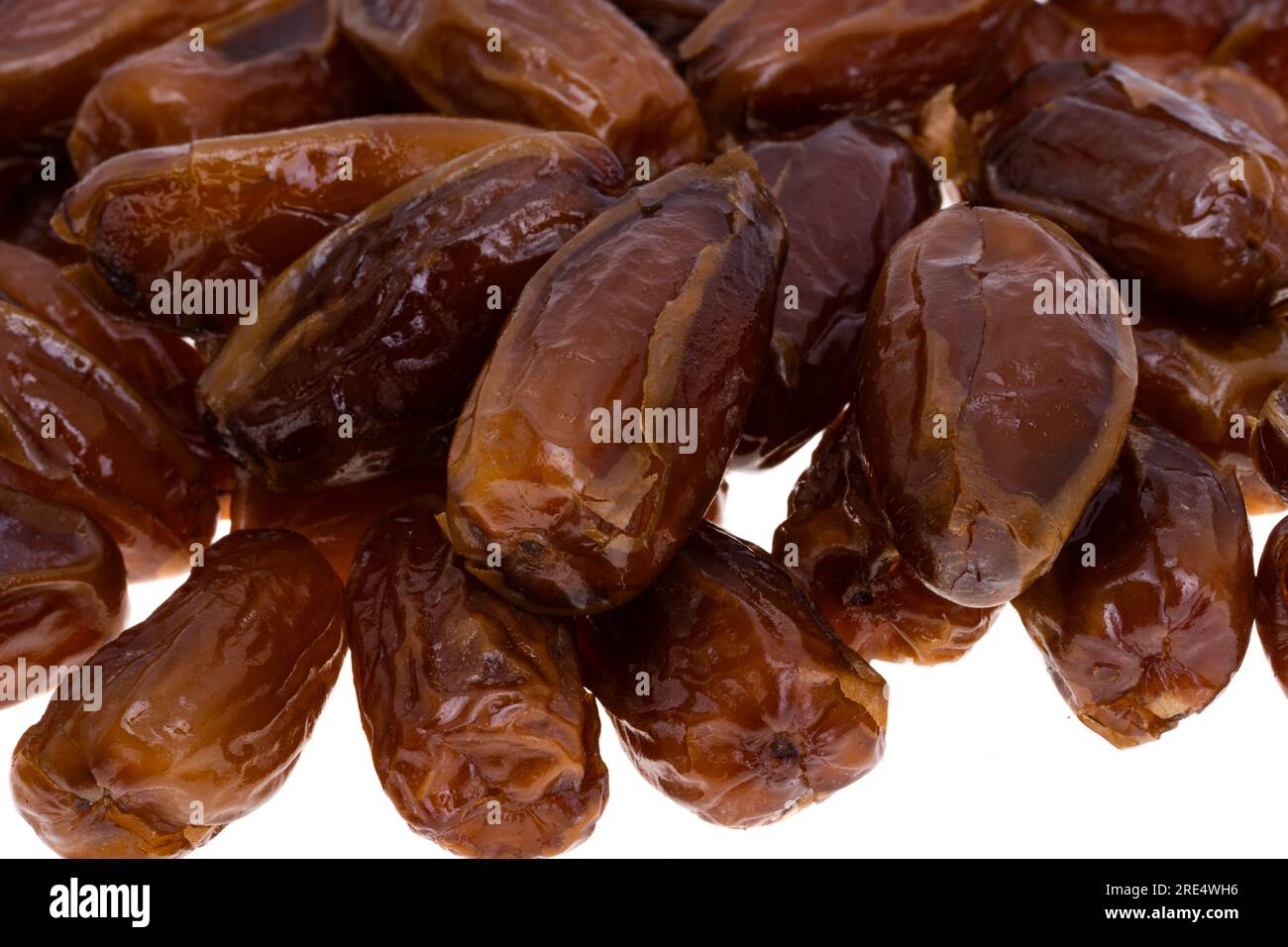 dates isolated on white background Stock Photo - Alamy