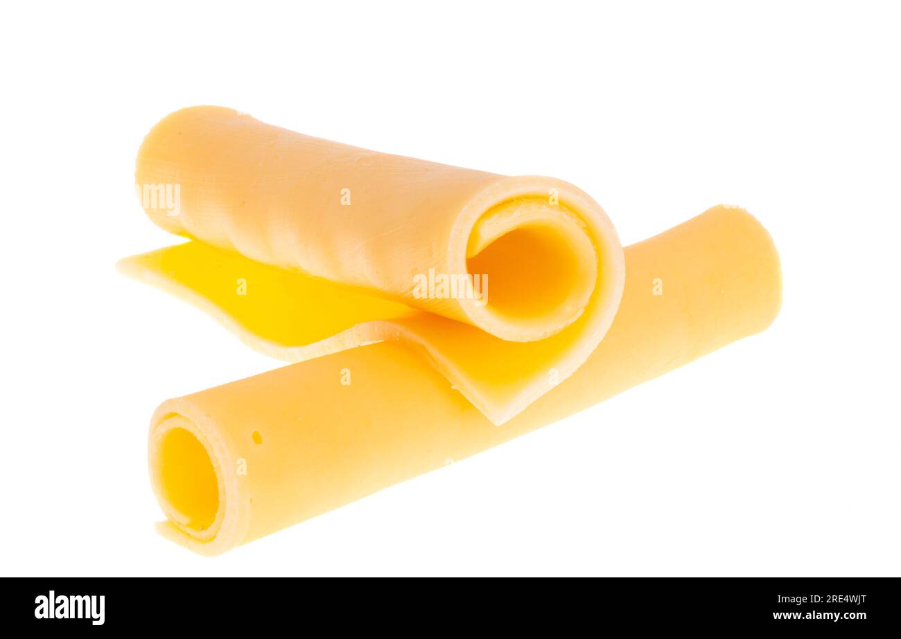 sliced cheese isolated on white background Stock Photo - Alamy