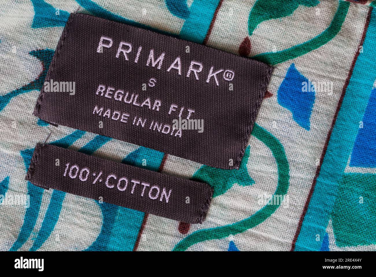 Primark 100% cotton label in shirt clothing made in India Stock Photo ...