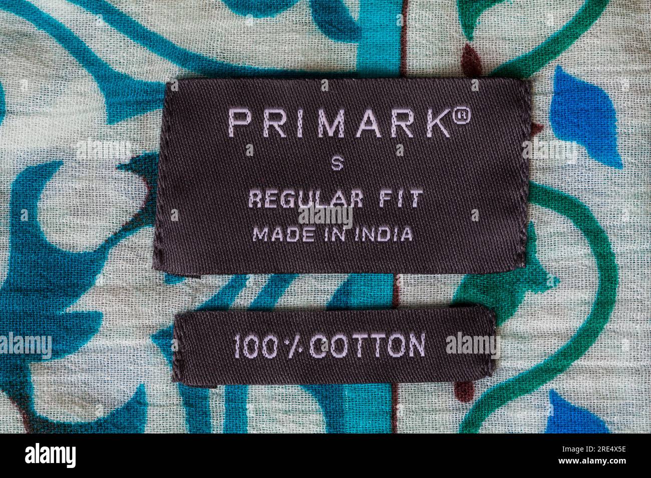 Primark 100% cotton label in shirt clothing made in India Stock Photo ...