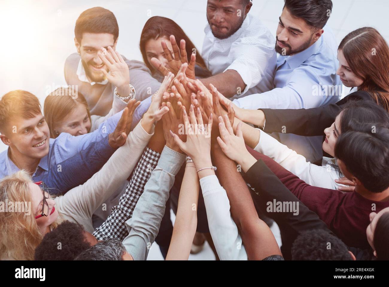 People of different ethnicities uniting to cooperate together Stock ...