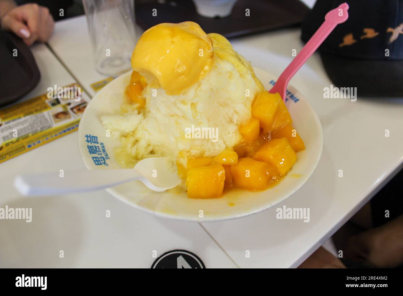 sweet mango ice cream huge portion Stock Photo - Alamy